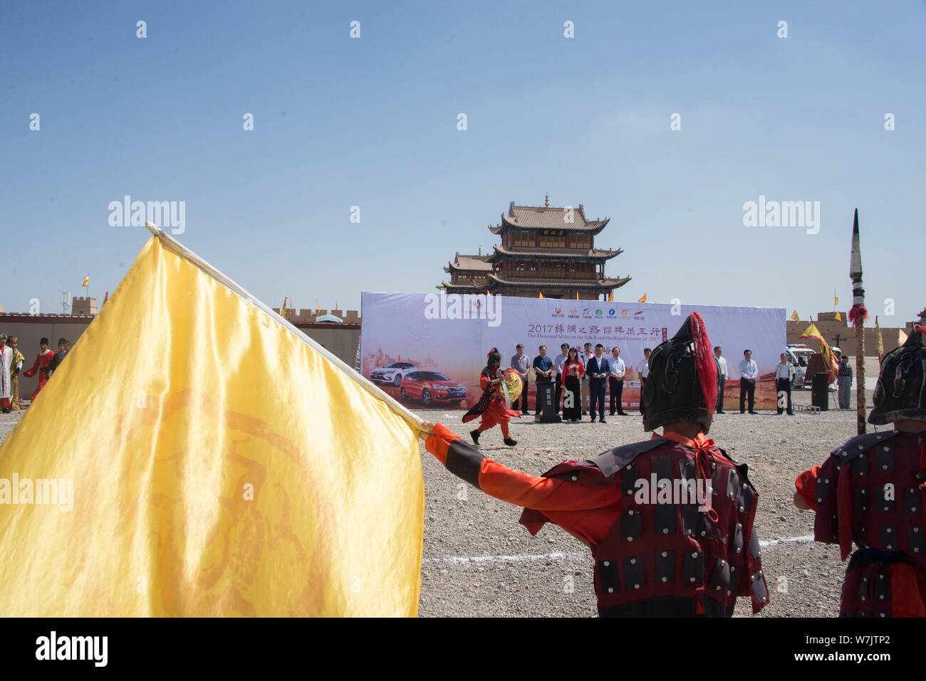 Chinese artists dressed in traditional costumes are seen during an ...