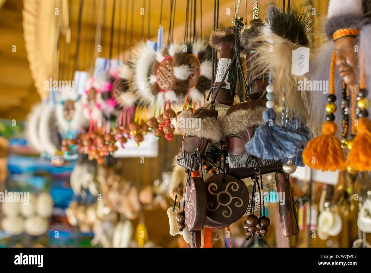 trinkets, national ornaments and amulets hang in a specialized shop on ...