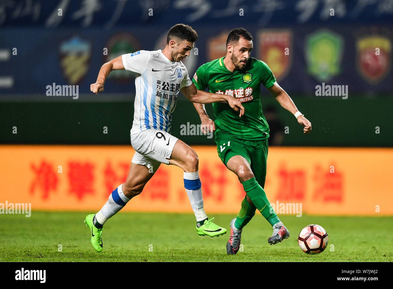 Greek Australian football player Apostolos Giannou, left, of Guangzhou ...