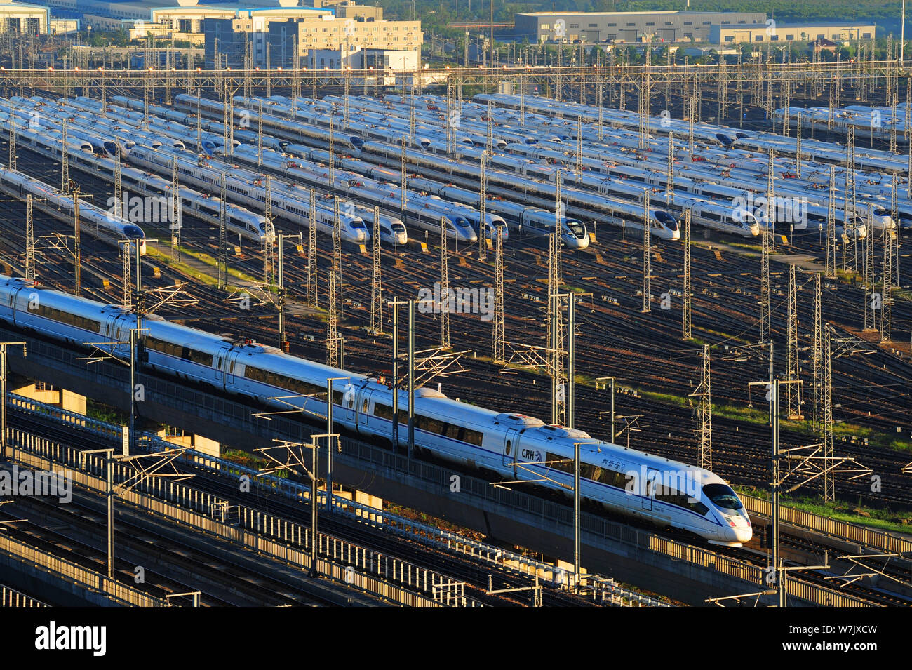 A high-speed bullet train leaves the Shanghai Hongqiao Railway Station ...