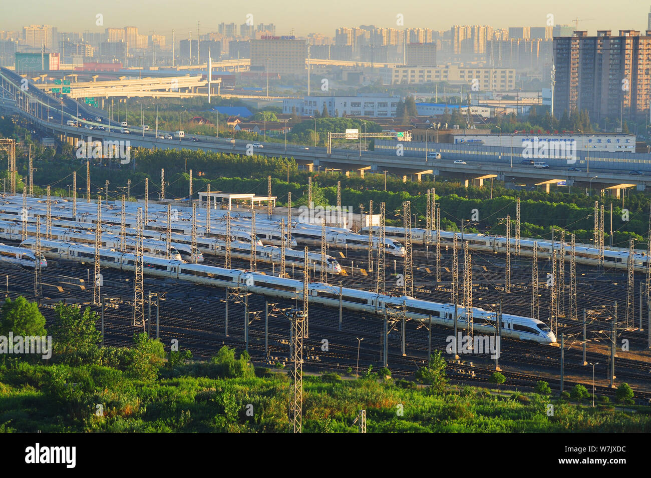 High-speed bullet train leave the Shanghai Hongqiao Railway Station ...