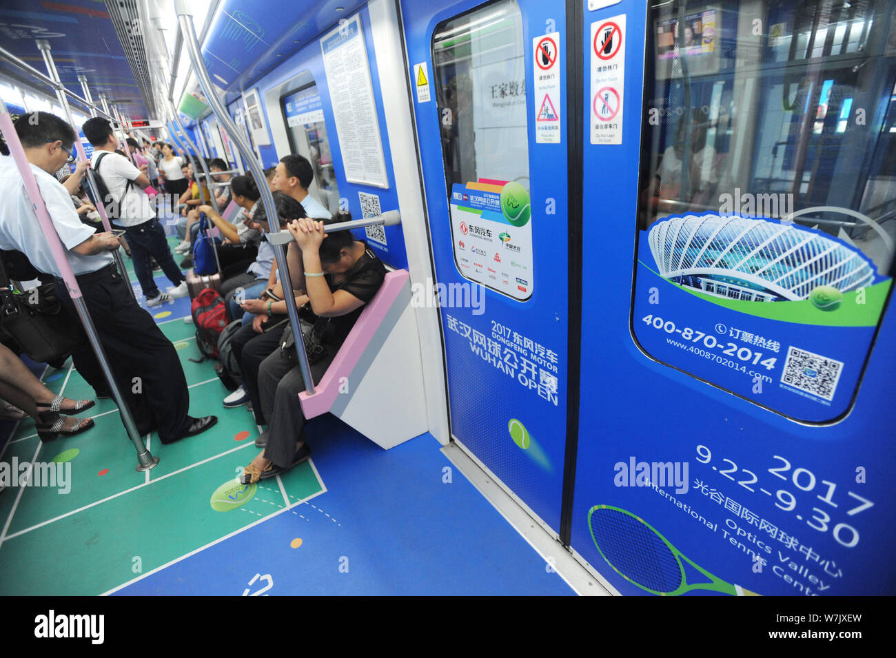 Passengers take a special subway train on the Metro Line 2 for the ...