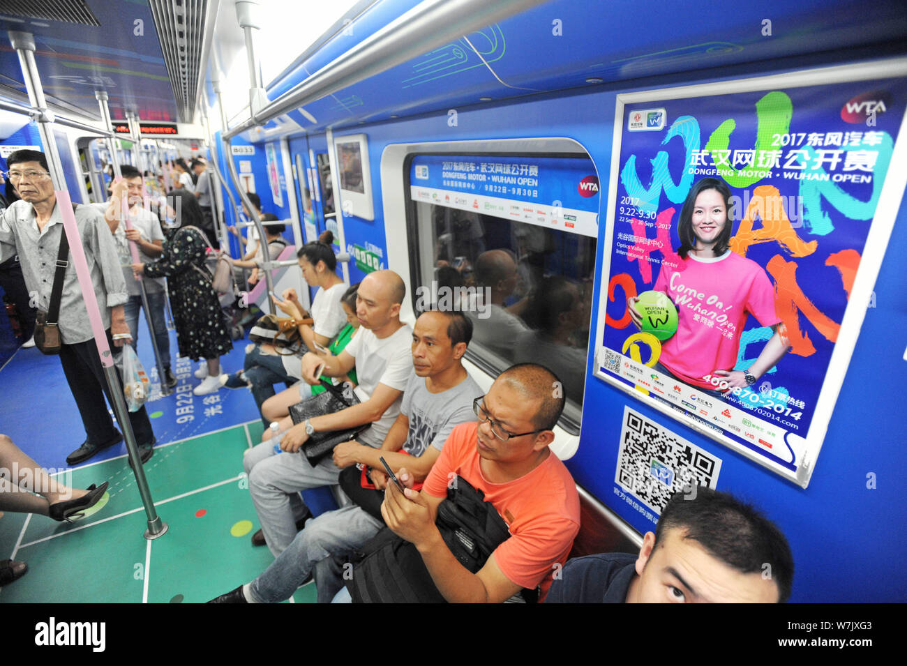 Passengers take a special subway train on the Metro Line 2 for the ...