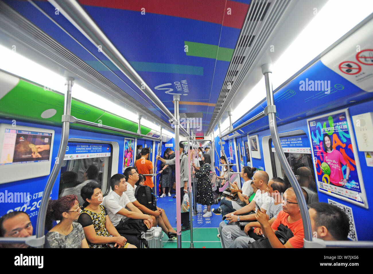 Passengers take a special subway train on the Metro Line 2 for the ...