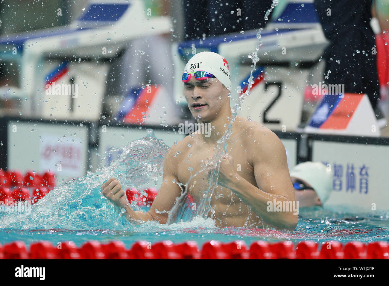 Chinese swimming star Sun Yang of Zhejiang celebrates after winning the ...