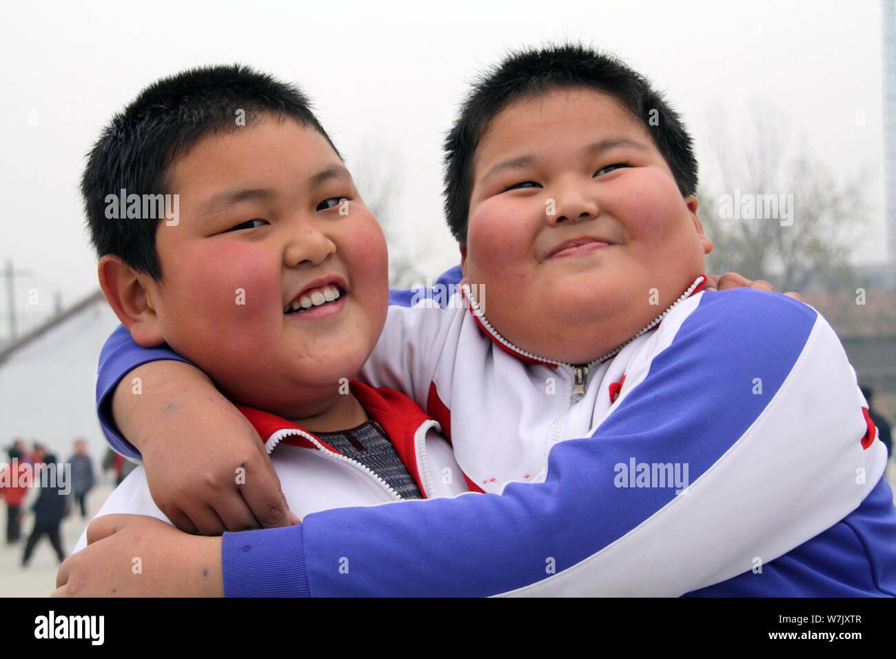 --FILE--Obese young boys play in a school in Binzhou city, east China's ...