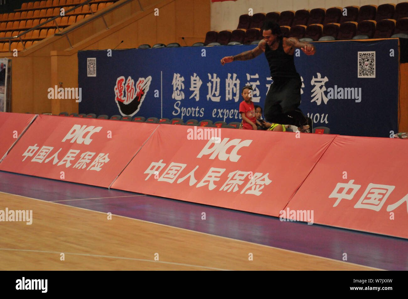 NBA star Shannon Brown shows his jumping skills during the warm-up of ...