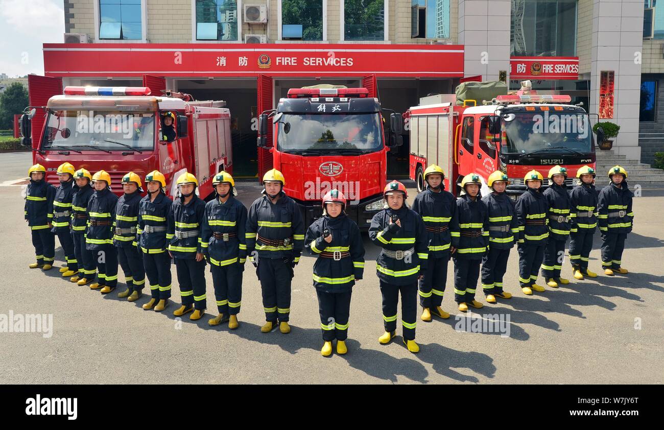 Fireman line up hi-res stock photography and images - Alamy