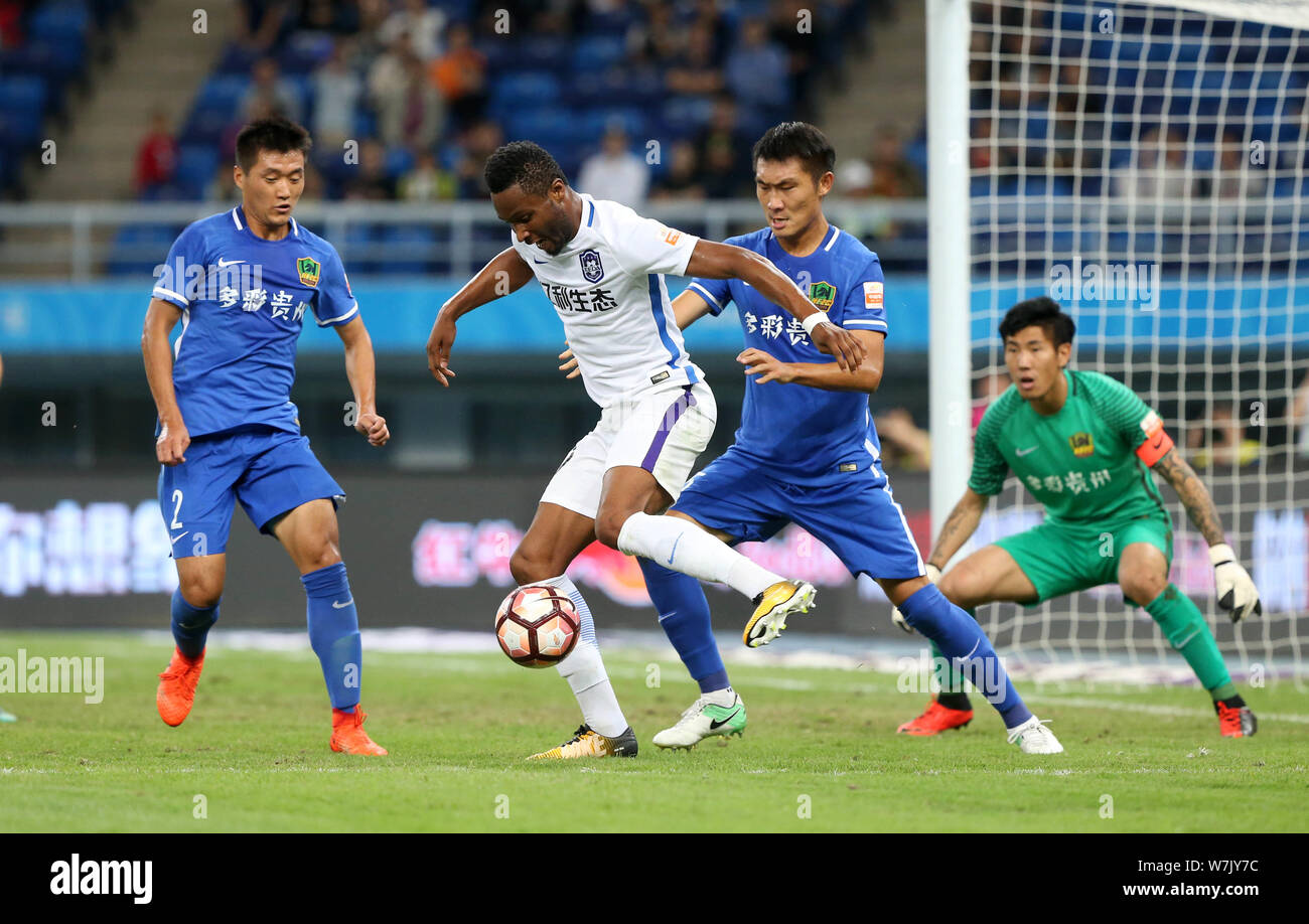 Nigerian football player John Obi Mikel, center, of Tianjin TEDA ...