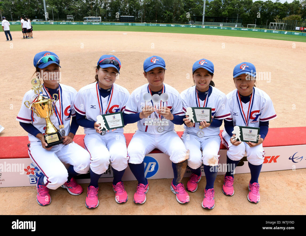 First runner-up Chinese Taipei players pose with their trophy after the ...
