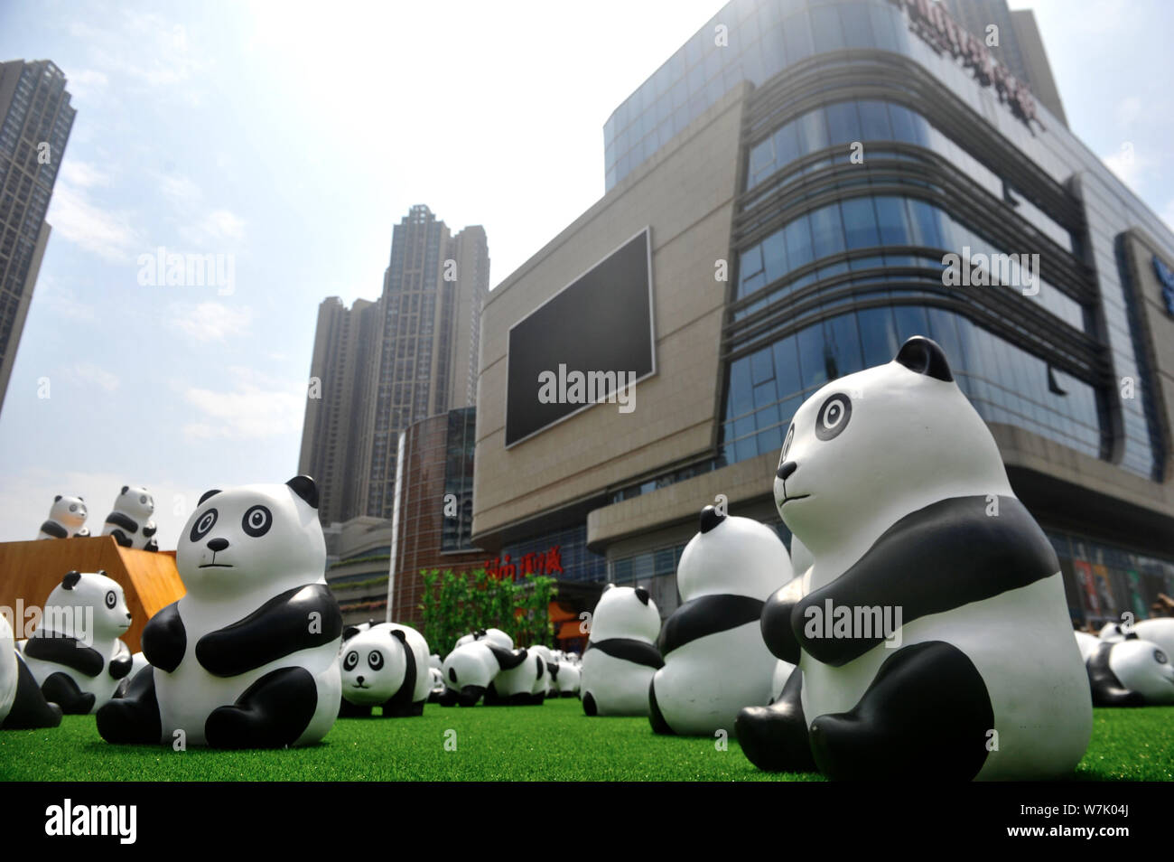 Giant panda sculptures are on display in front of the UniPark shopping ...