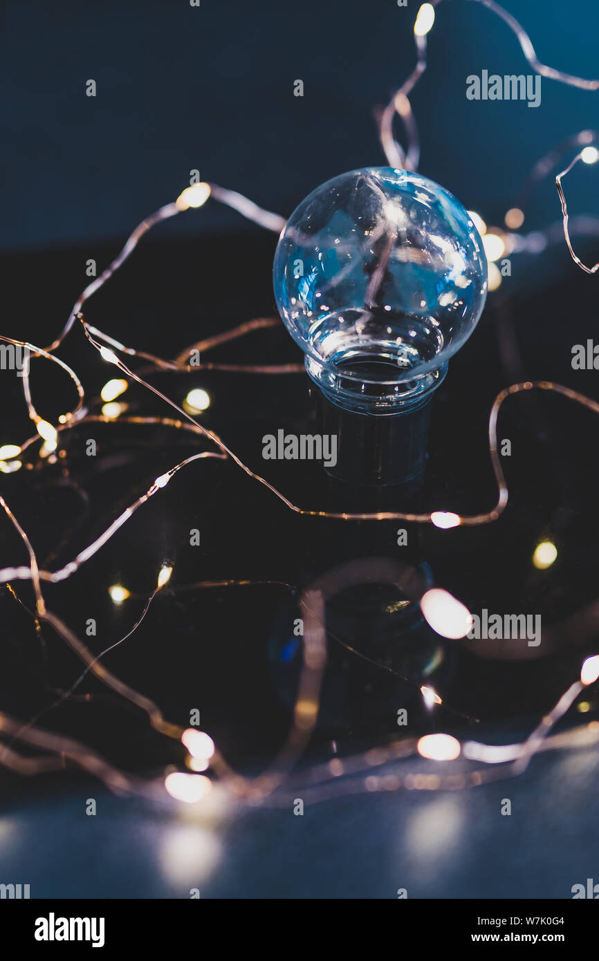 light bulb on clipboard surrounded by string lights, concept of new ...