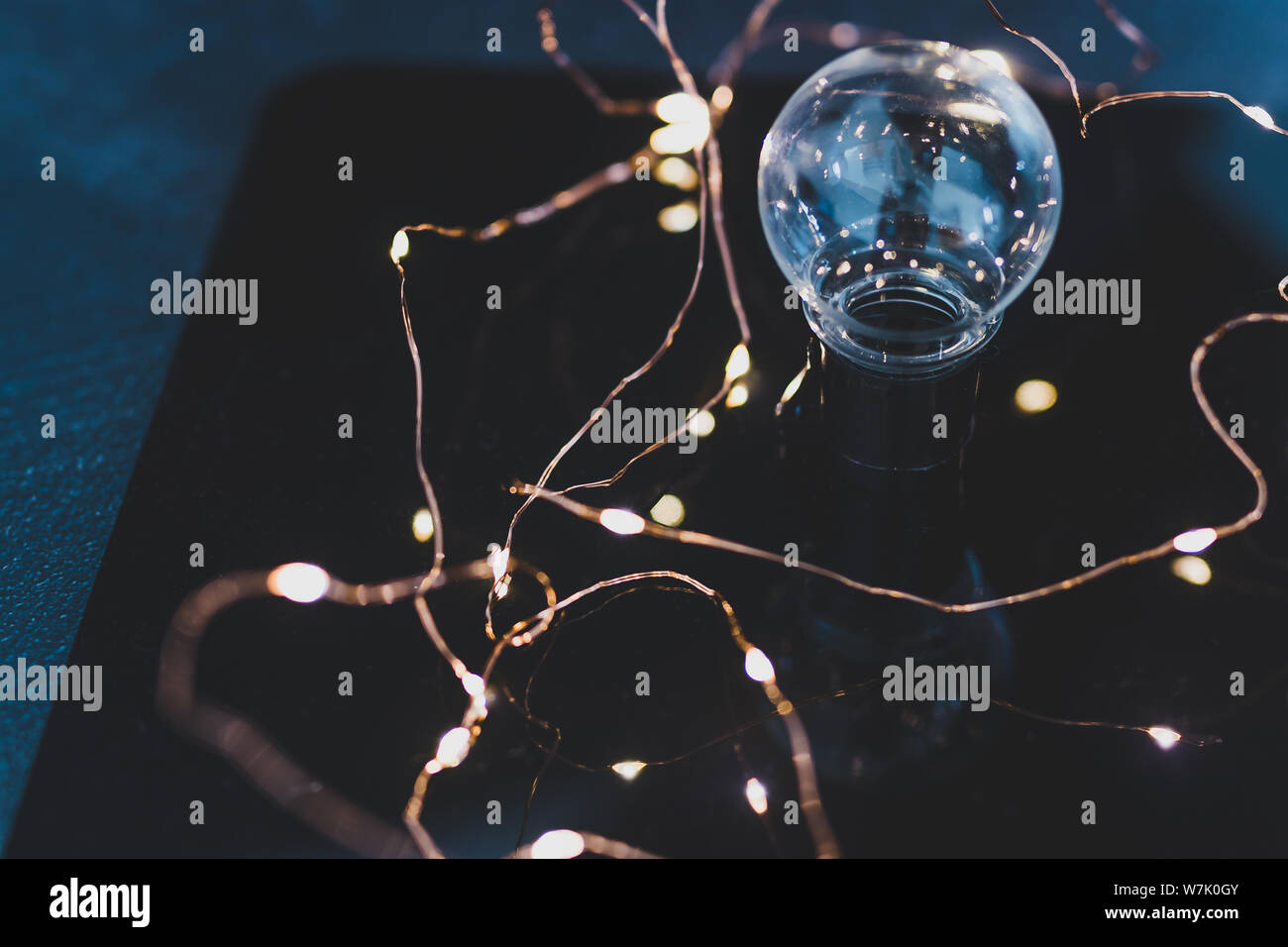 light bulb on clipboard surrounded by string lights, concept of new ...