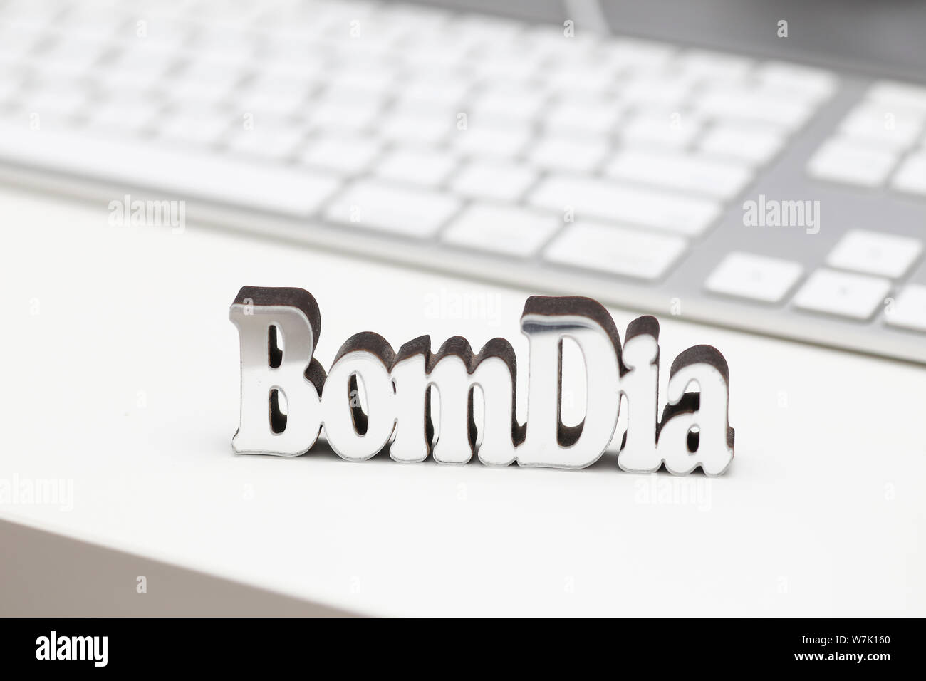 "Bom Dia" - Good Morning Letters Message Above a Minimalist Desk Stock ...