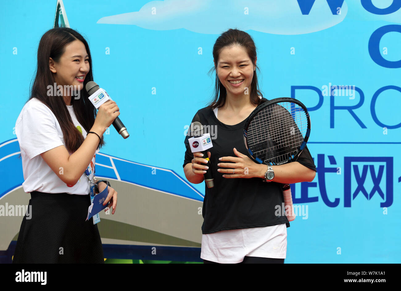 Chinese two-time Grand Slam champion Li Na, right, attends the 2017 WTA ...