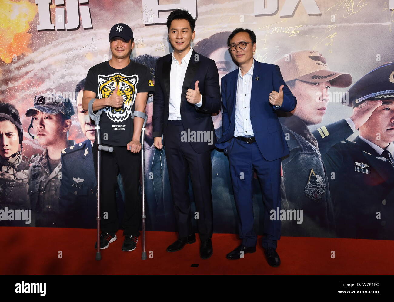 (From left) Chinese actors Wu Jing and Li Chen, producer Lv Jianmin ...