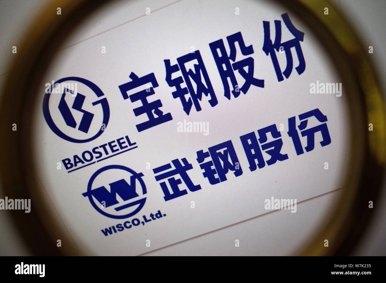 --FILE--A netizen browses an online image of the logos of Baoshan Iron ...