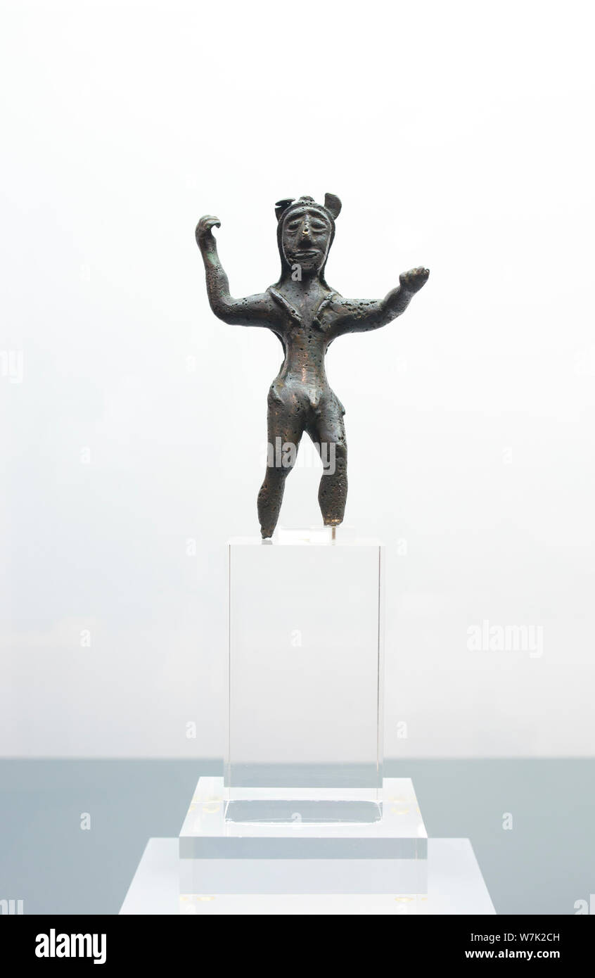 Seville, Spain - May 31th, 2019: Small bronze figurine of Phoenician ...