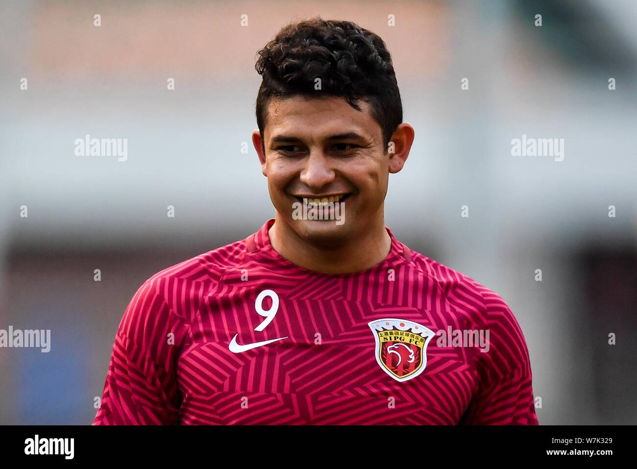Brazilian football player Elkeson of Shanghai SIPG takes part in a ...