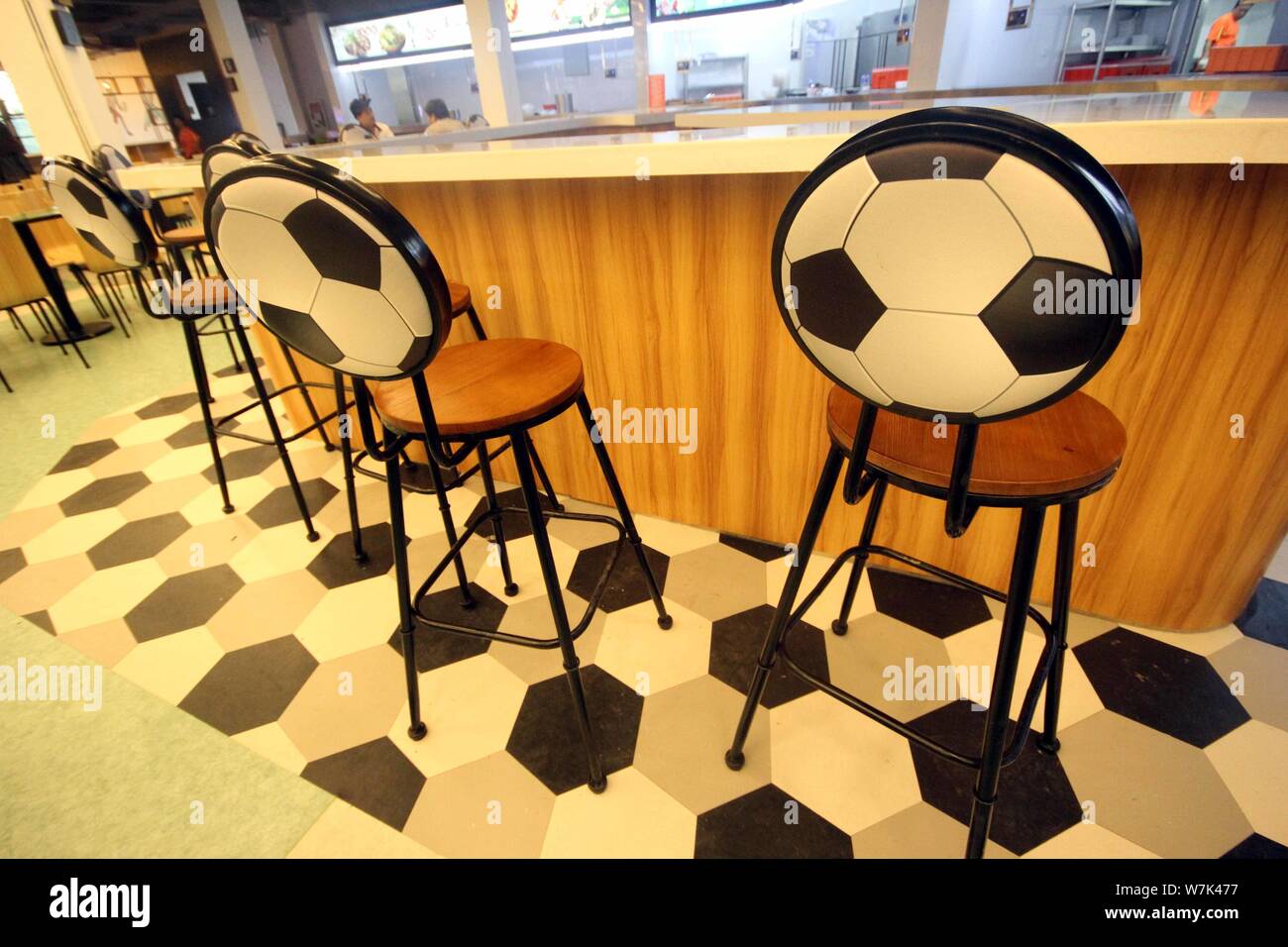 View of chairs featuring soccer elements at a sports-themed canteen in ...