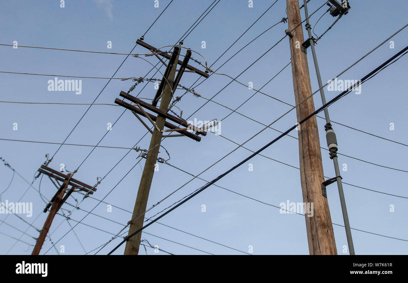 Line wooden poles hi-res stock photography and images - Alamy