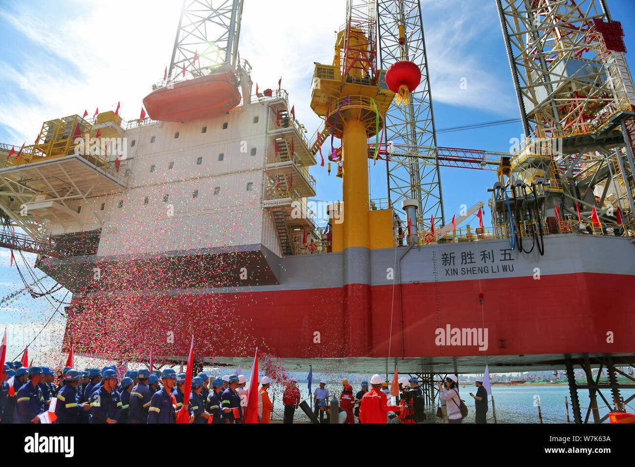 Chinese workers attend the delivery ceremony of the ''Xin Shengli Wu ...