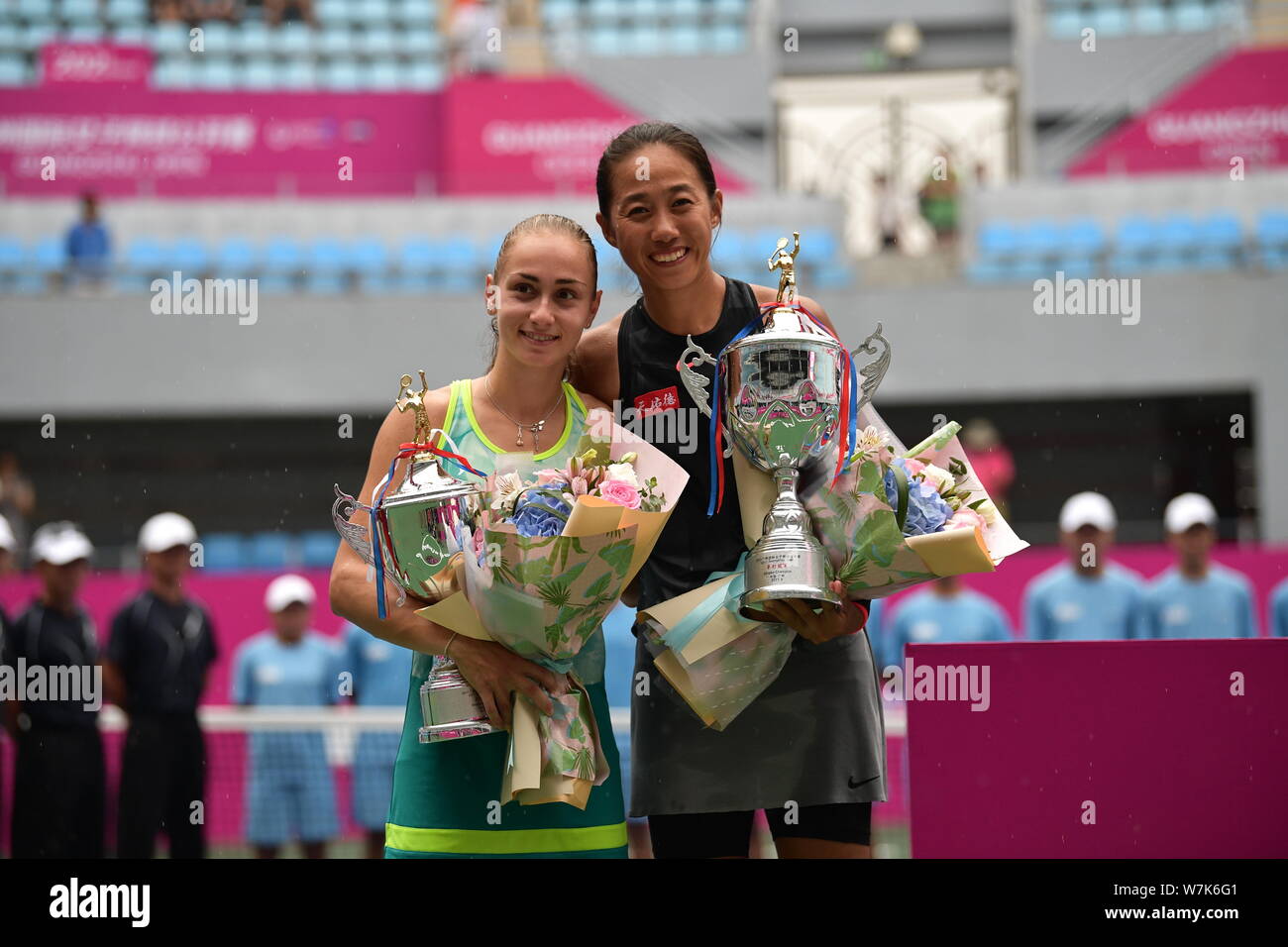 Zhang Shuai of China, right, and Aleksandra Krunic of Serbia pose with ...
