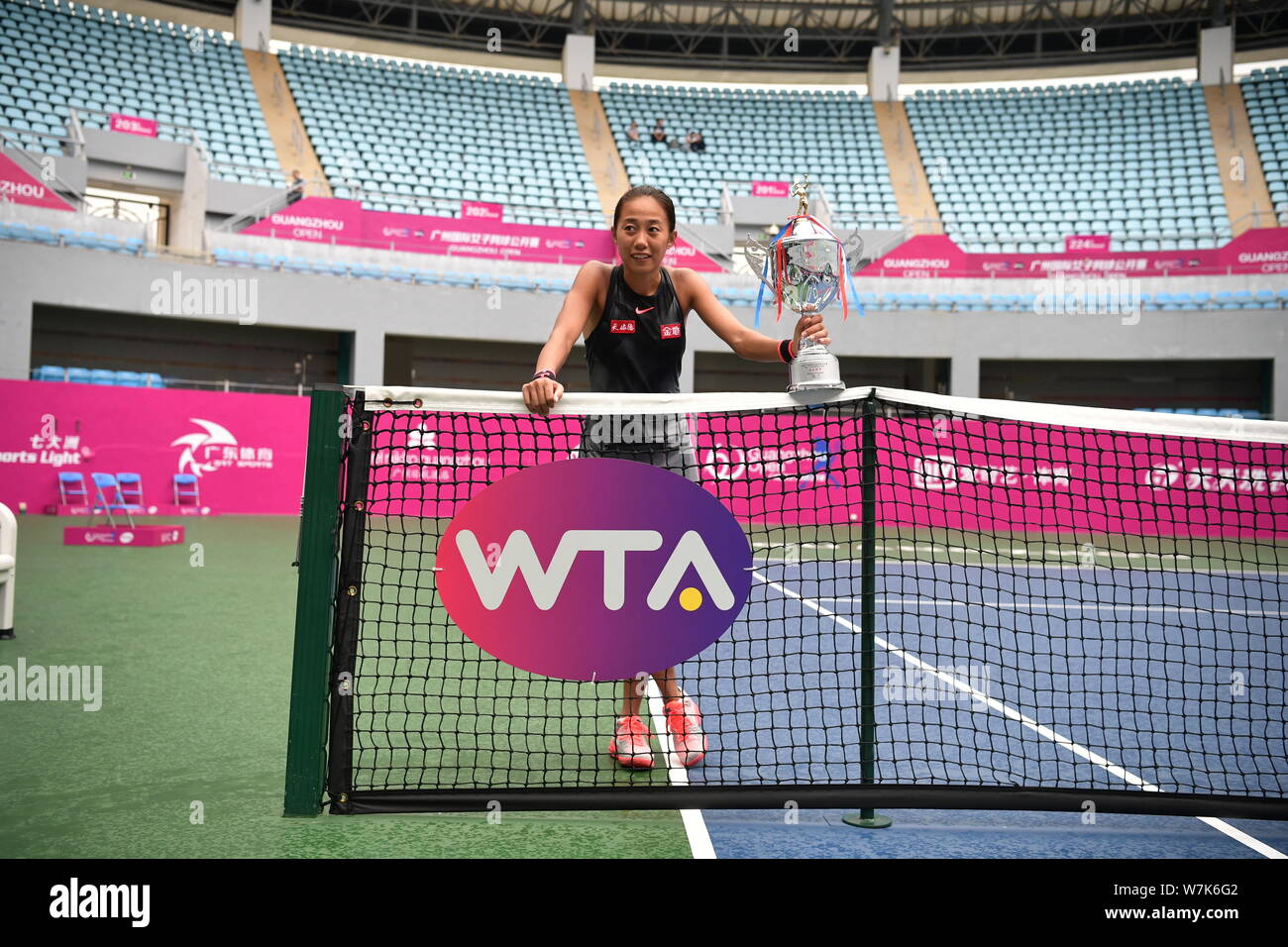 Zhang Shuai of China poses with her champion trophy after the women's ...