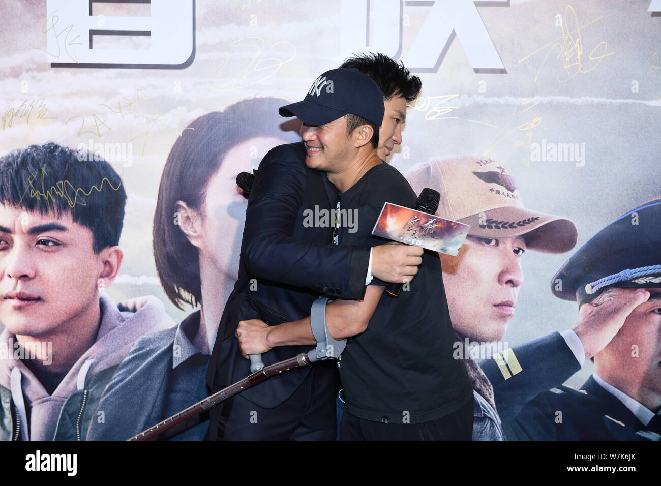 Chinese actors Li Chen, left, and Wu Jing arrive on the red carpet for ...