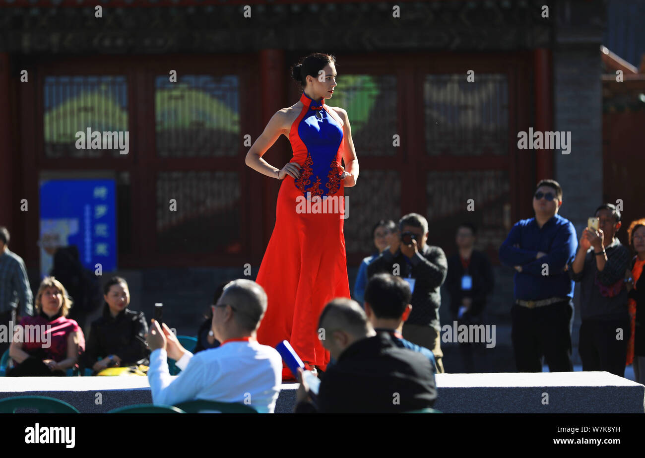 A model displays cheongsam, also known as qipao in Chinese, during the ...