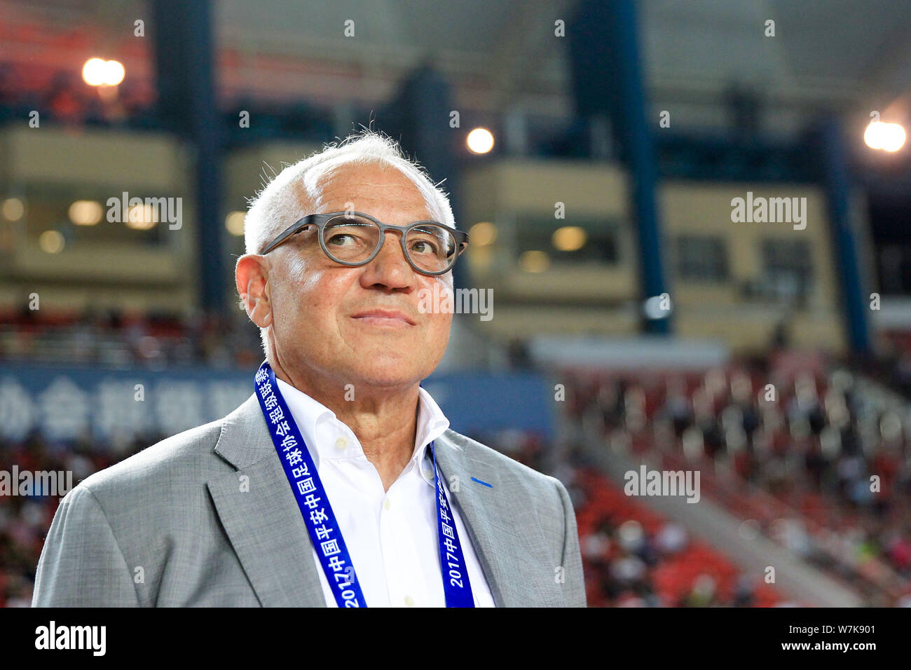 Head coach Felix Magath of Shandong Luneng reacts as he watches his ...