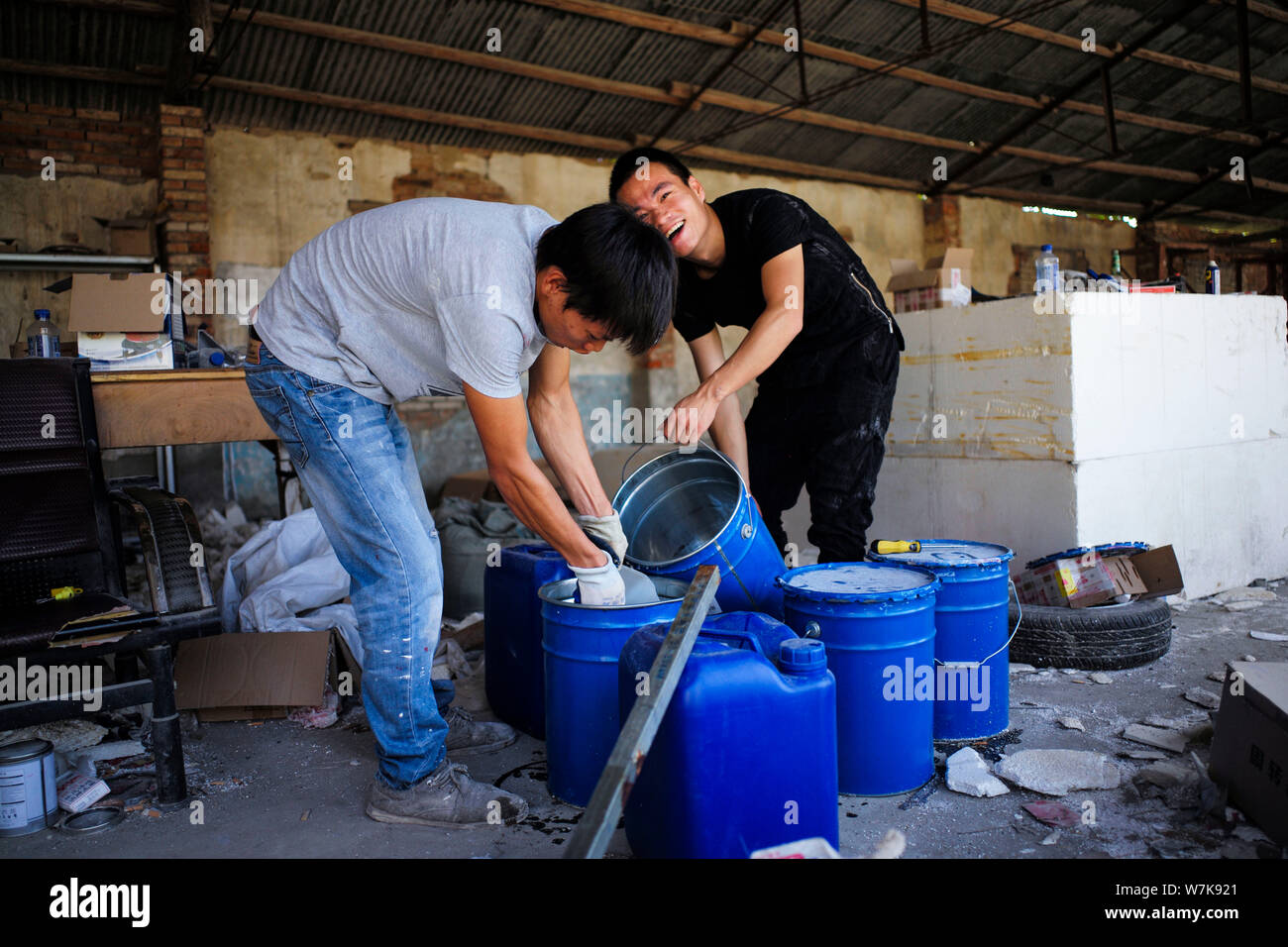 Chinese model airplane hobbyists Wan Li, right, and Huang Aibo build ...