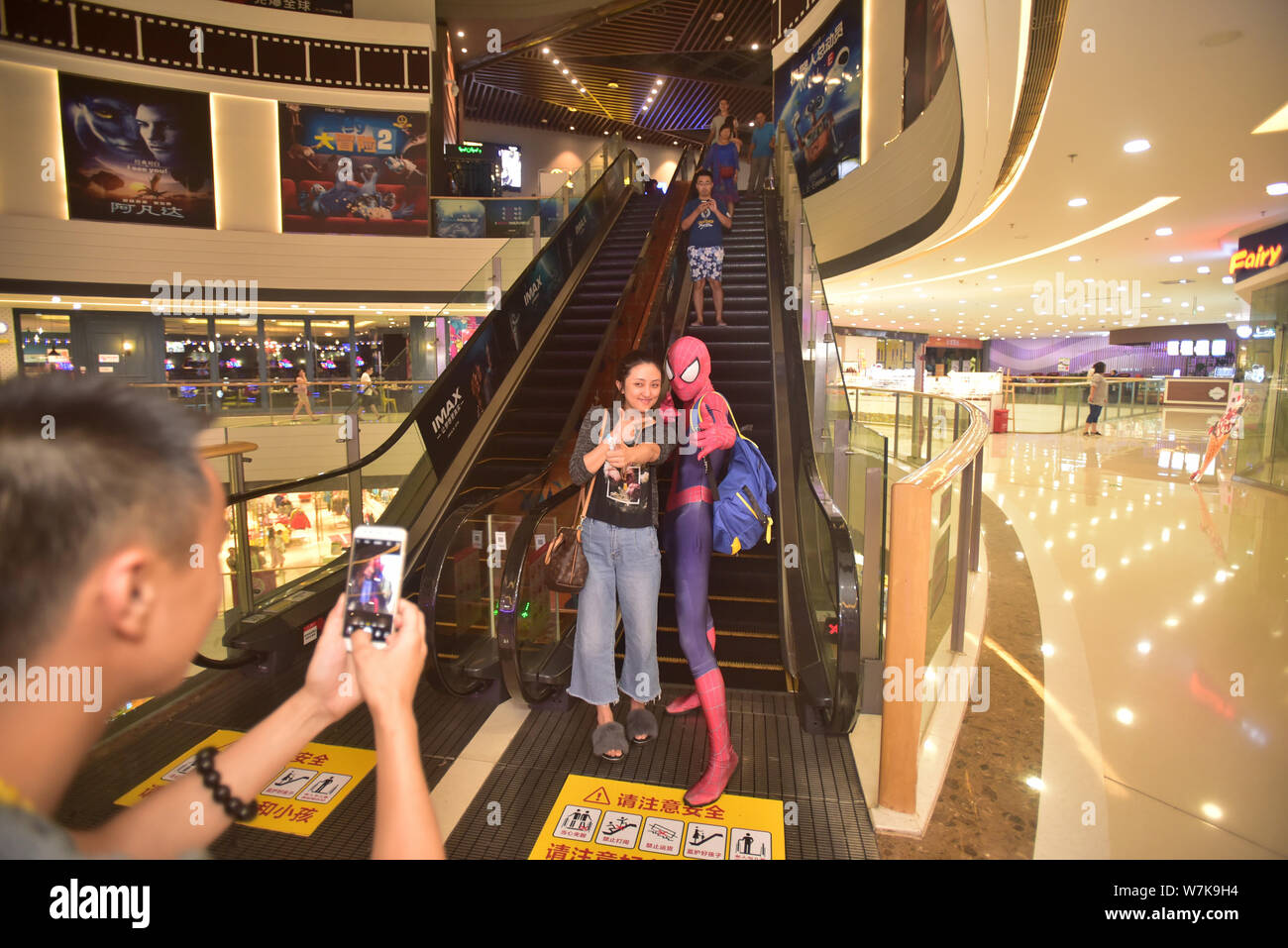 22-year-old Chinese coser Zeng Yi dressed as Spider-Man poses with a ...