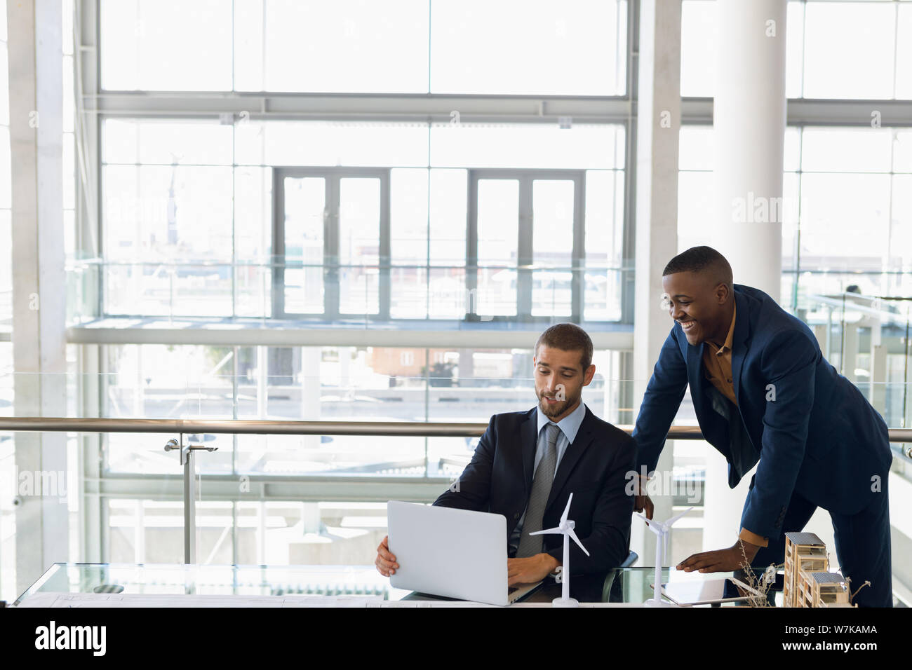 Two businessmen working together hi-res stock photography and images ...