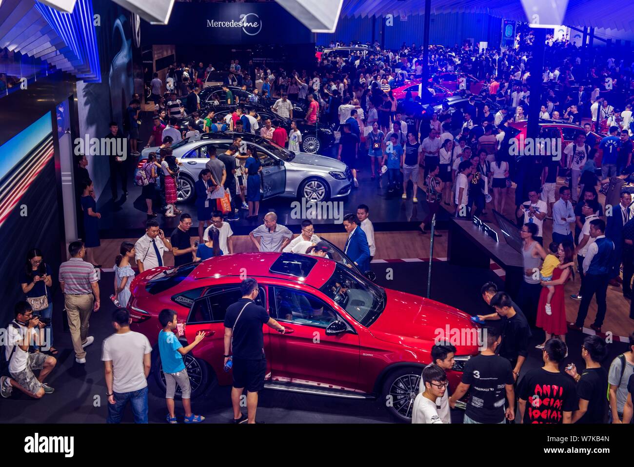--FILE--Visitors crowd the stand of Mercedes-Benz during an auto show ...
