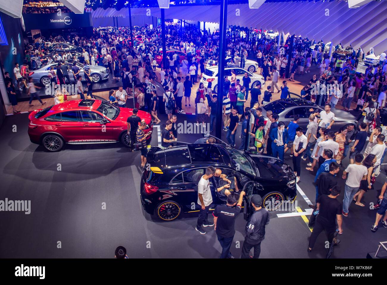 --FILE--Visitors crowd the stand of Mercedes-Benz during an auto show ...