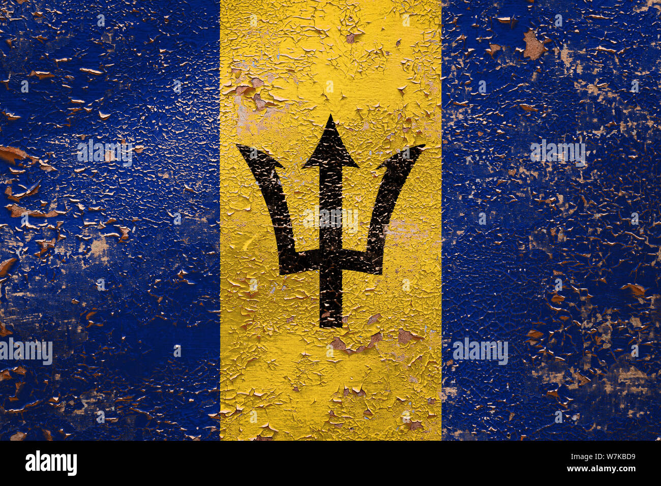 National flag of Barbados on old peeling wall background.The concept of ...