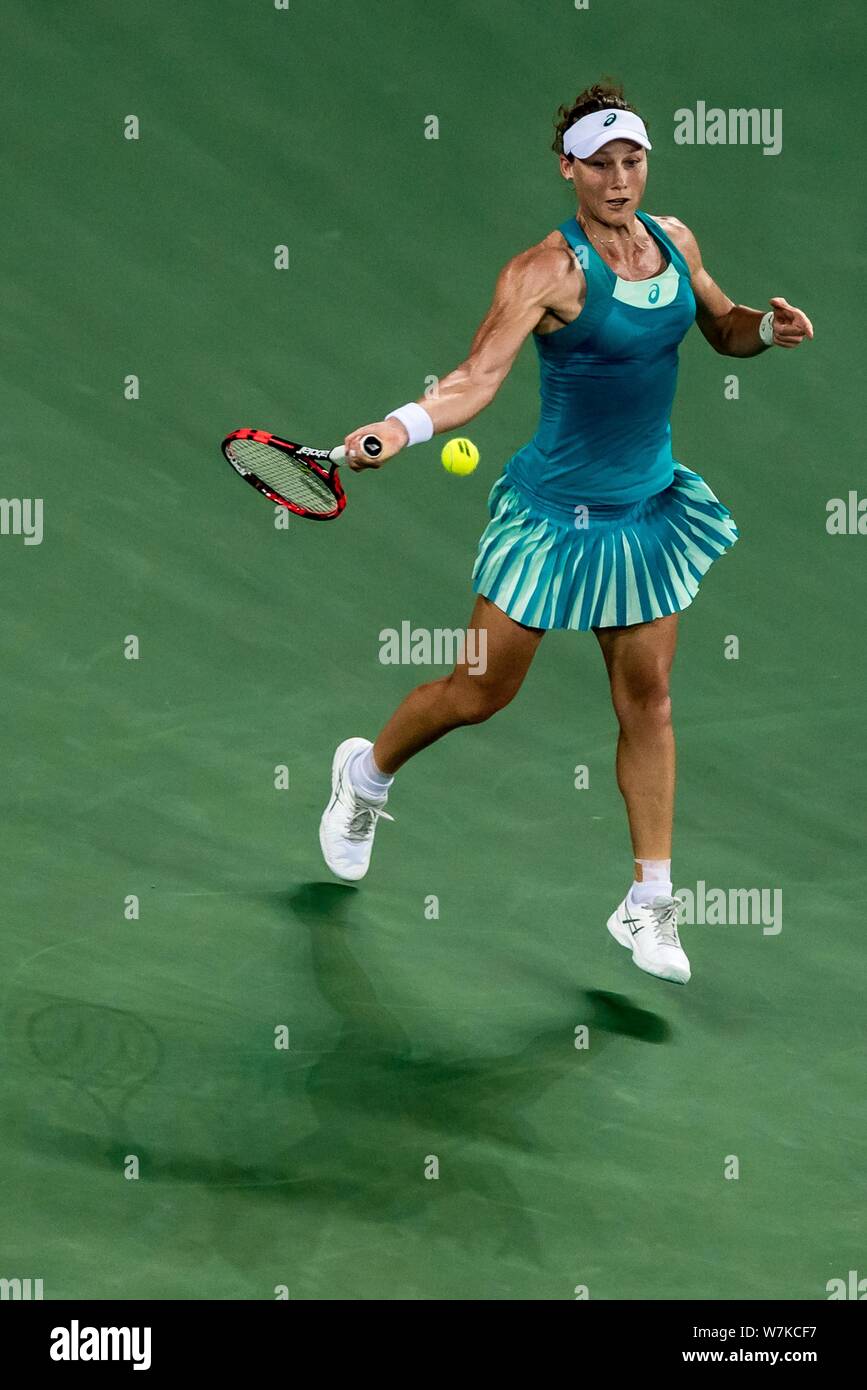 Samantha Stosur of Australia returns a shot to Han Xinyun of China in ...