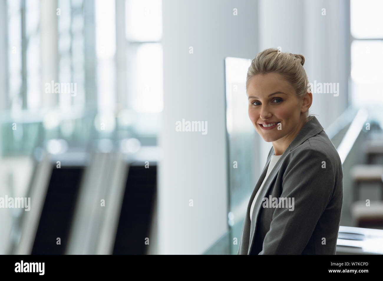 Happy young woman office hi-res stock photography and images - Alamy