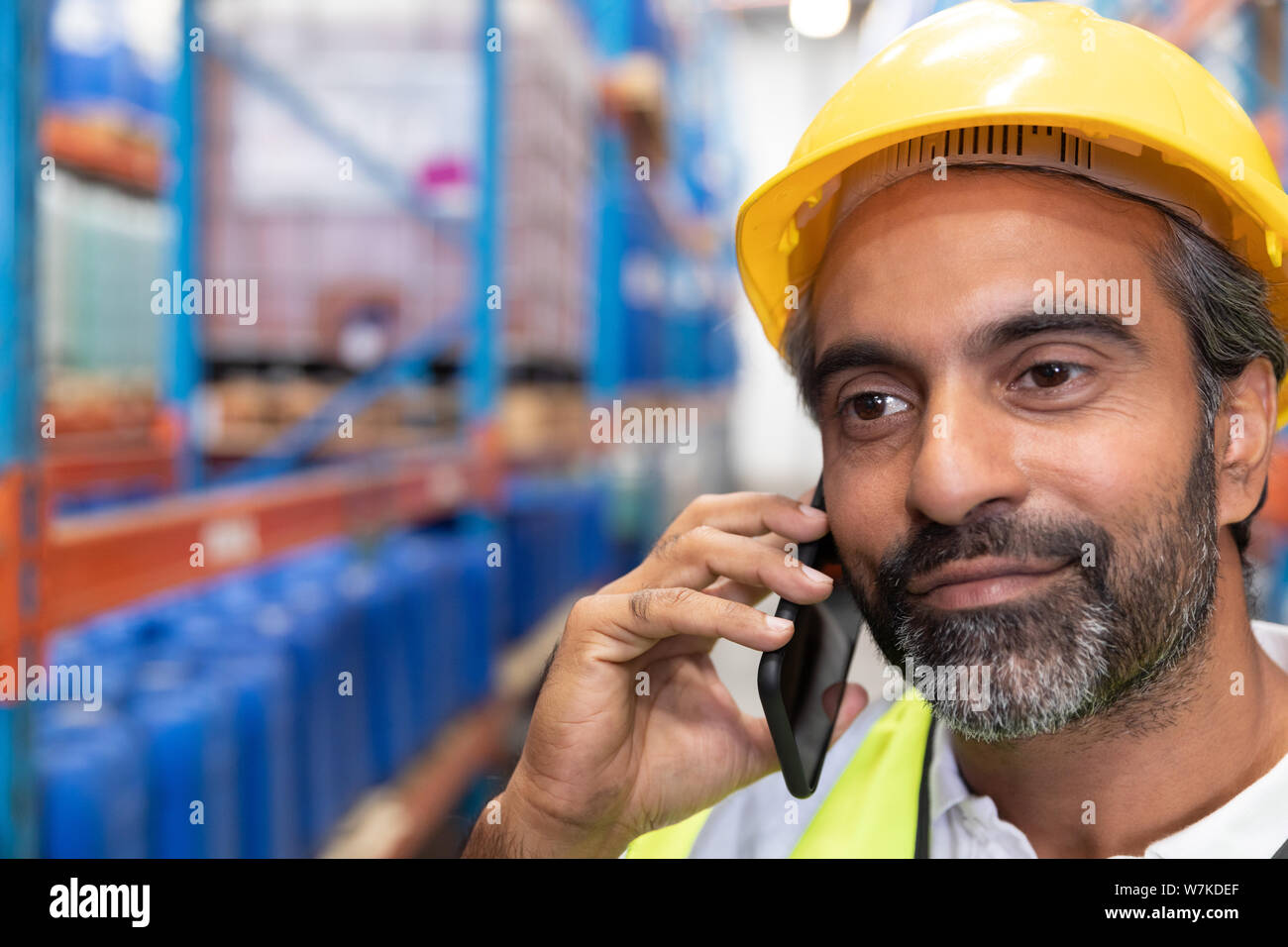 Male worker talking hi-res stock photography and images - Alamy