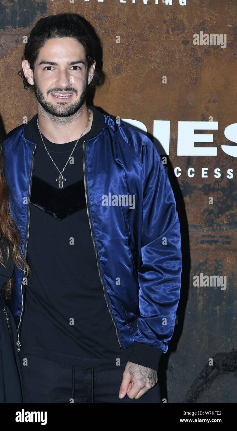 Brazilian soccer player Alexandre Pato of Tianjin Quanjian F.C. attends ...