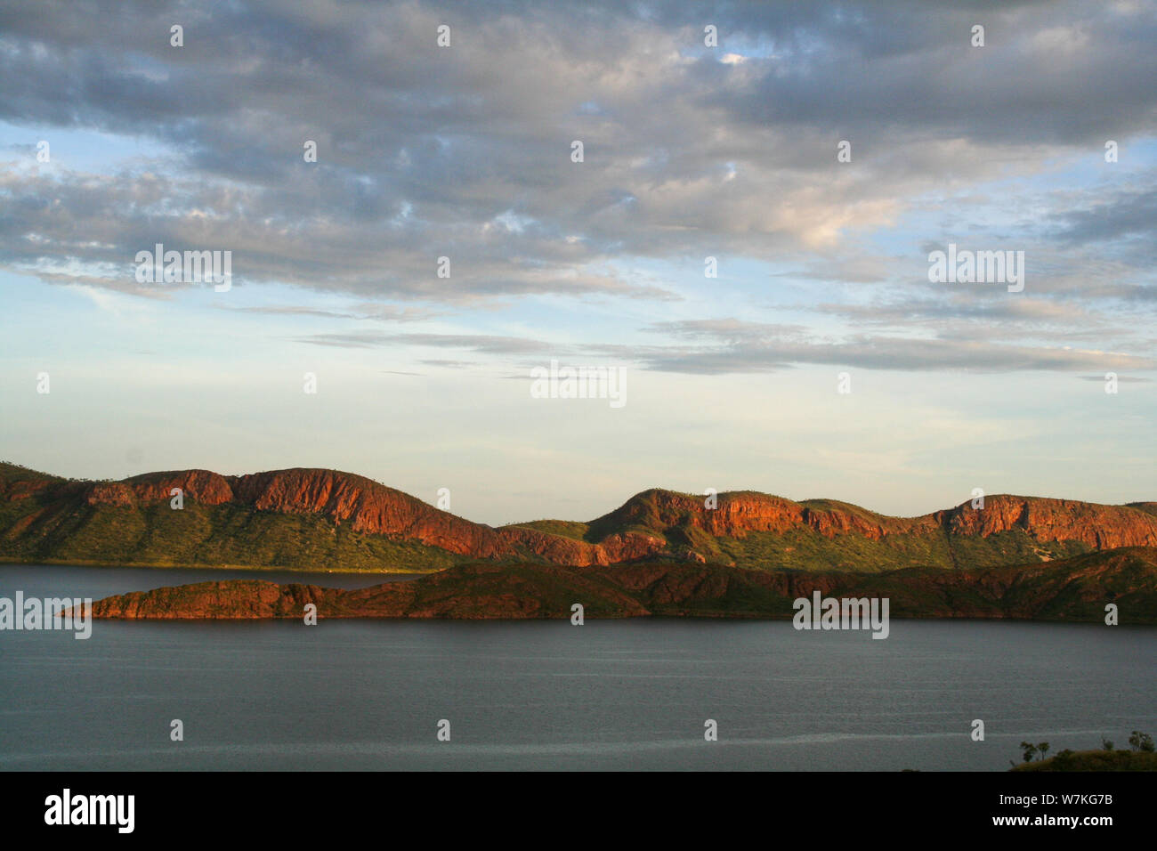 Red rocks in Australian lake Stock Photo - Alamy