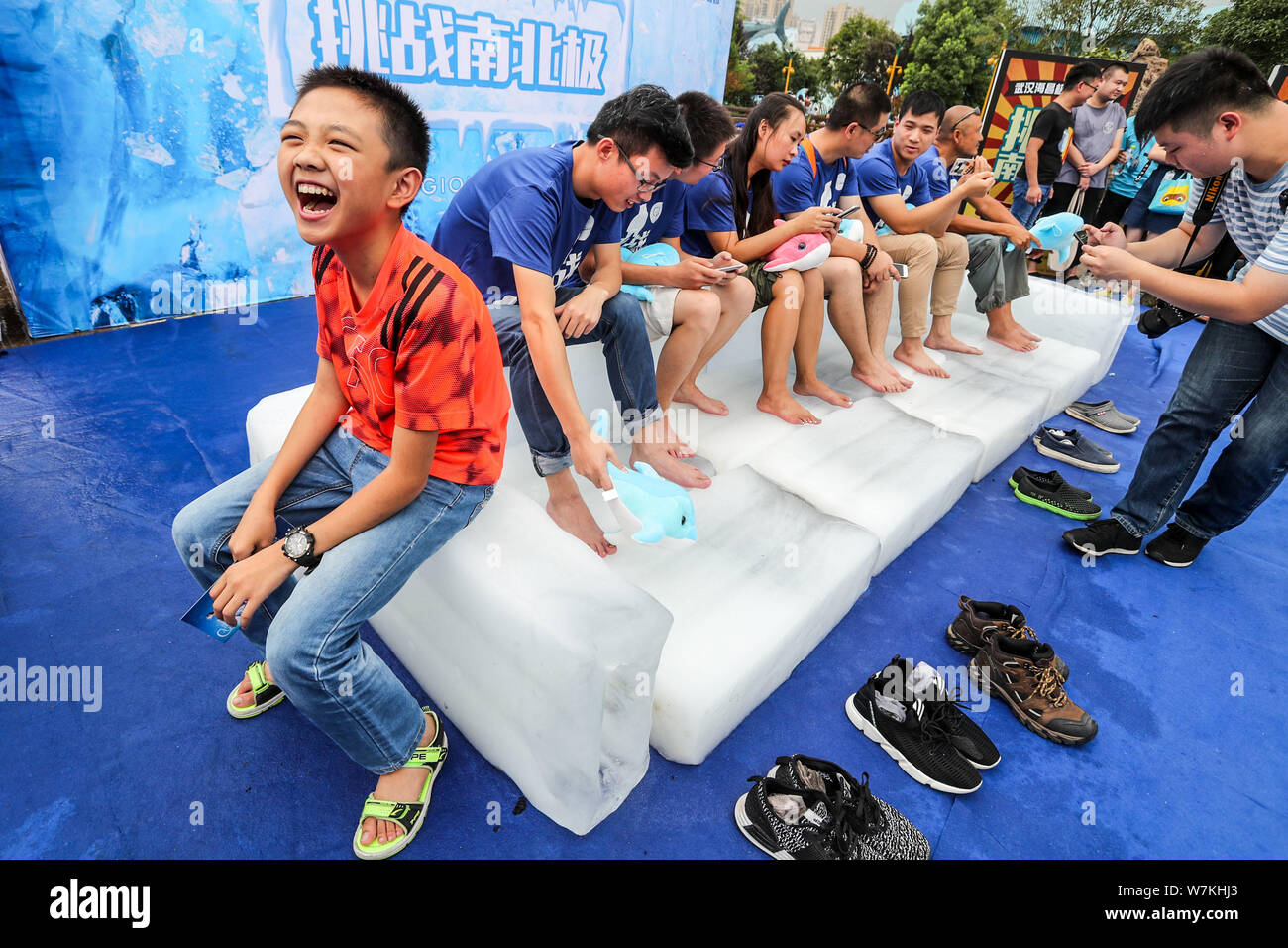 Participants sit on the ice block chairs during the first Cold ...