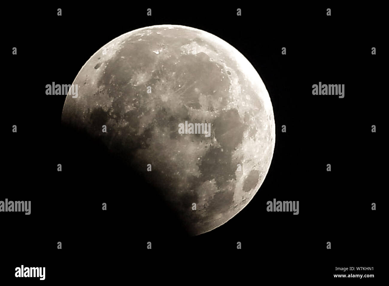 A portion of the moon crosses into the earth's shadow during partial ...