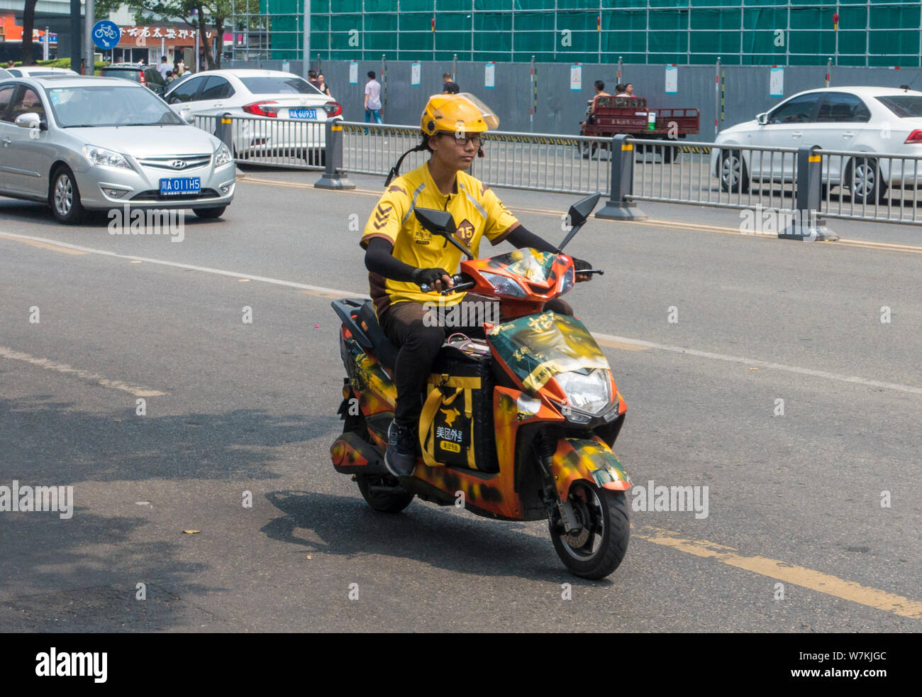 --FILE--A food delivery courier of Chinese online food delivery company ... --FILE--A food delivery courier of Chinese online food delivery company ...