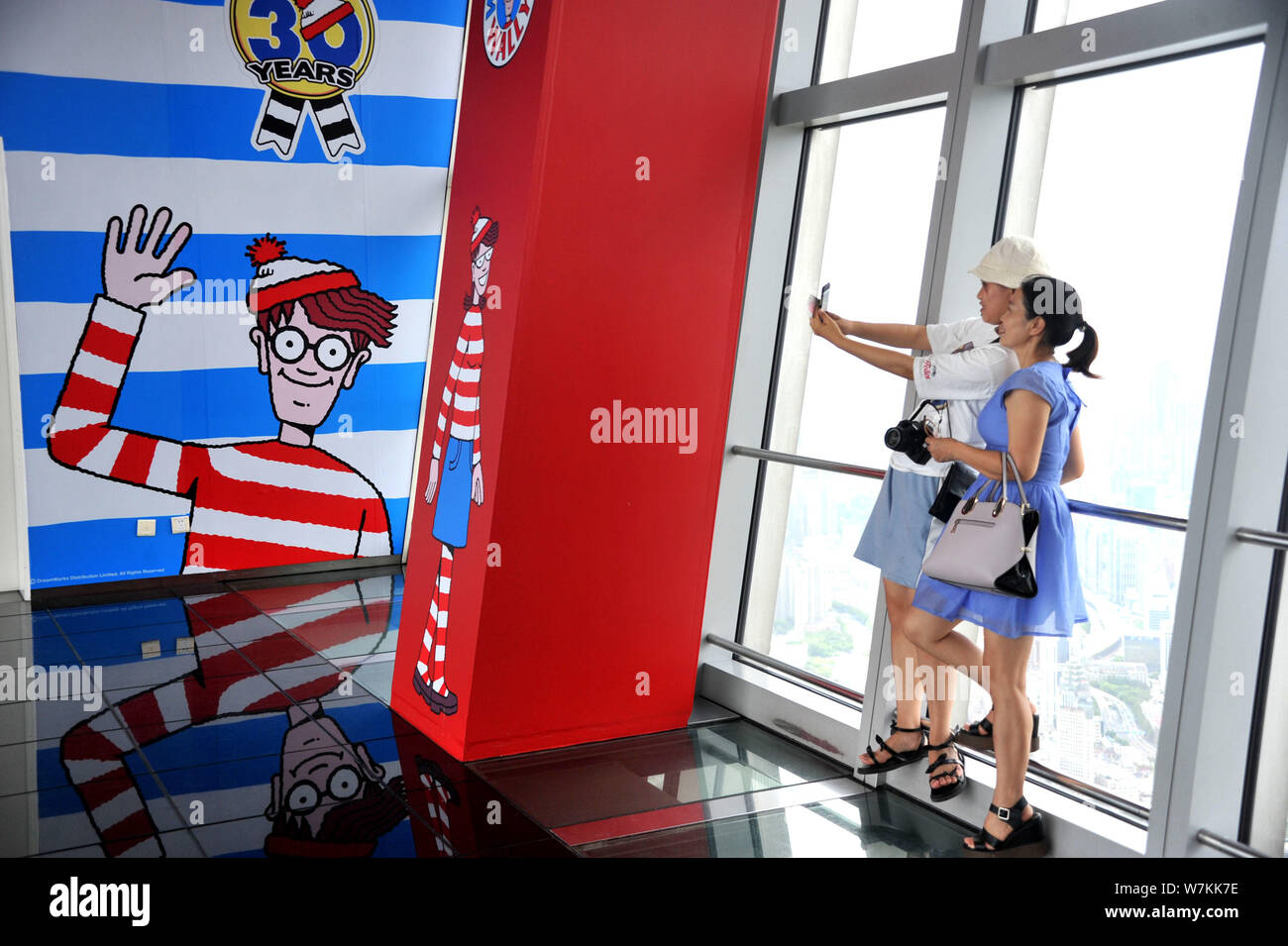 People visit the exhibition centering on the popular British cartoon ...