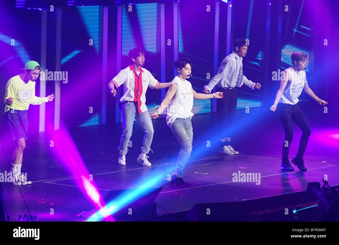 Members of South Korean boy group SHINee perform during the SMtown ...