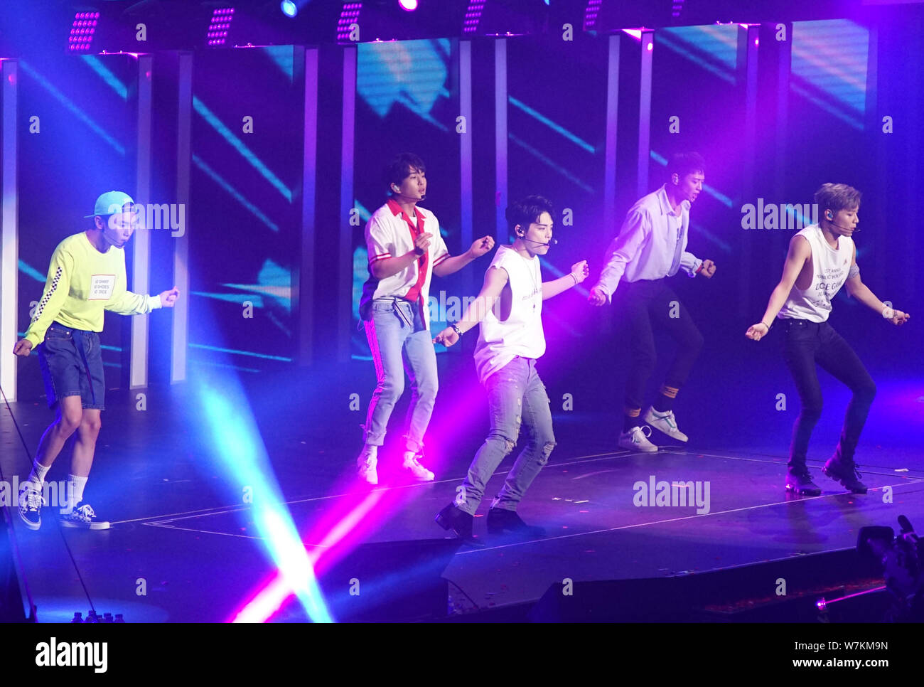 Members of South Korean boy group SHINee perform during the SMtown ...