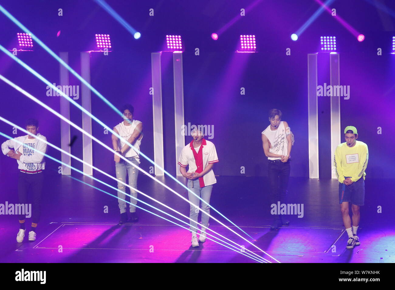 Members of South Korean boy group SHINee perform during the SMtown ...