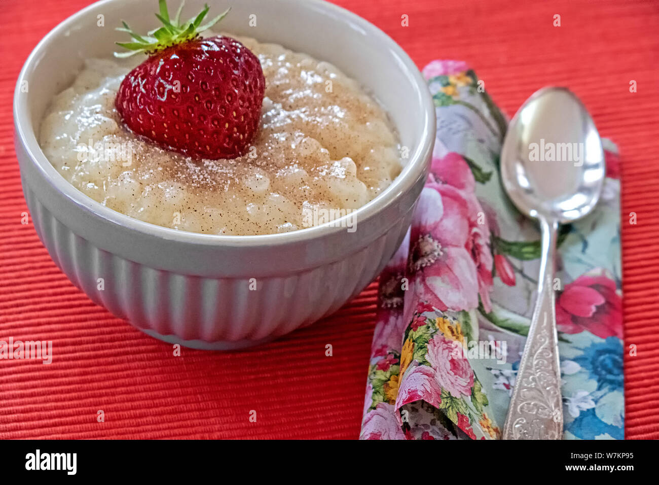 rice pudding with ripe red strawberry Stock Photo - Alamy